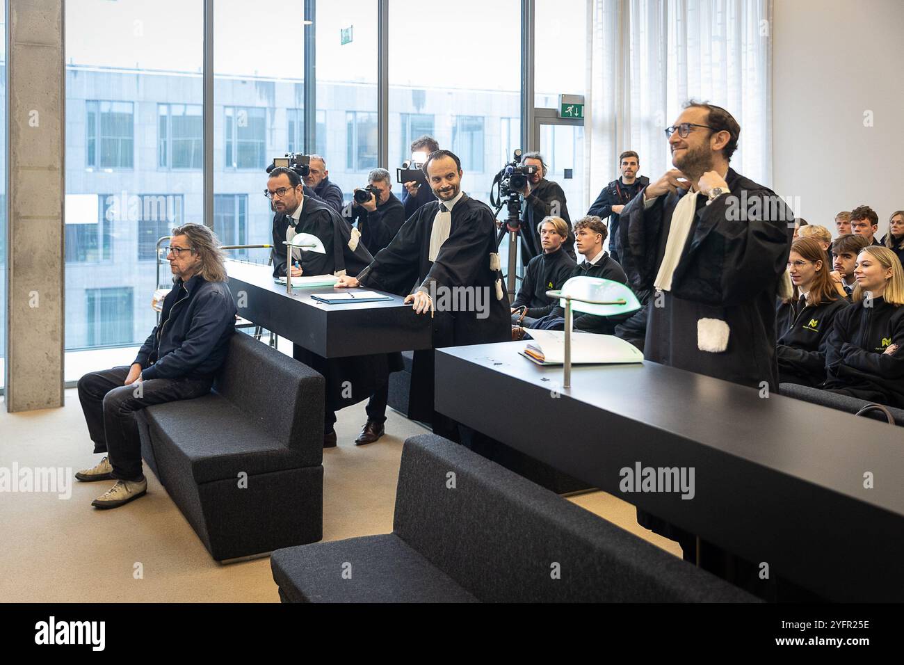 Writer Herman Brusselmans, Lawyer Omar Souidi, Lawyer Mounir Souidi and ...