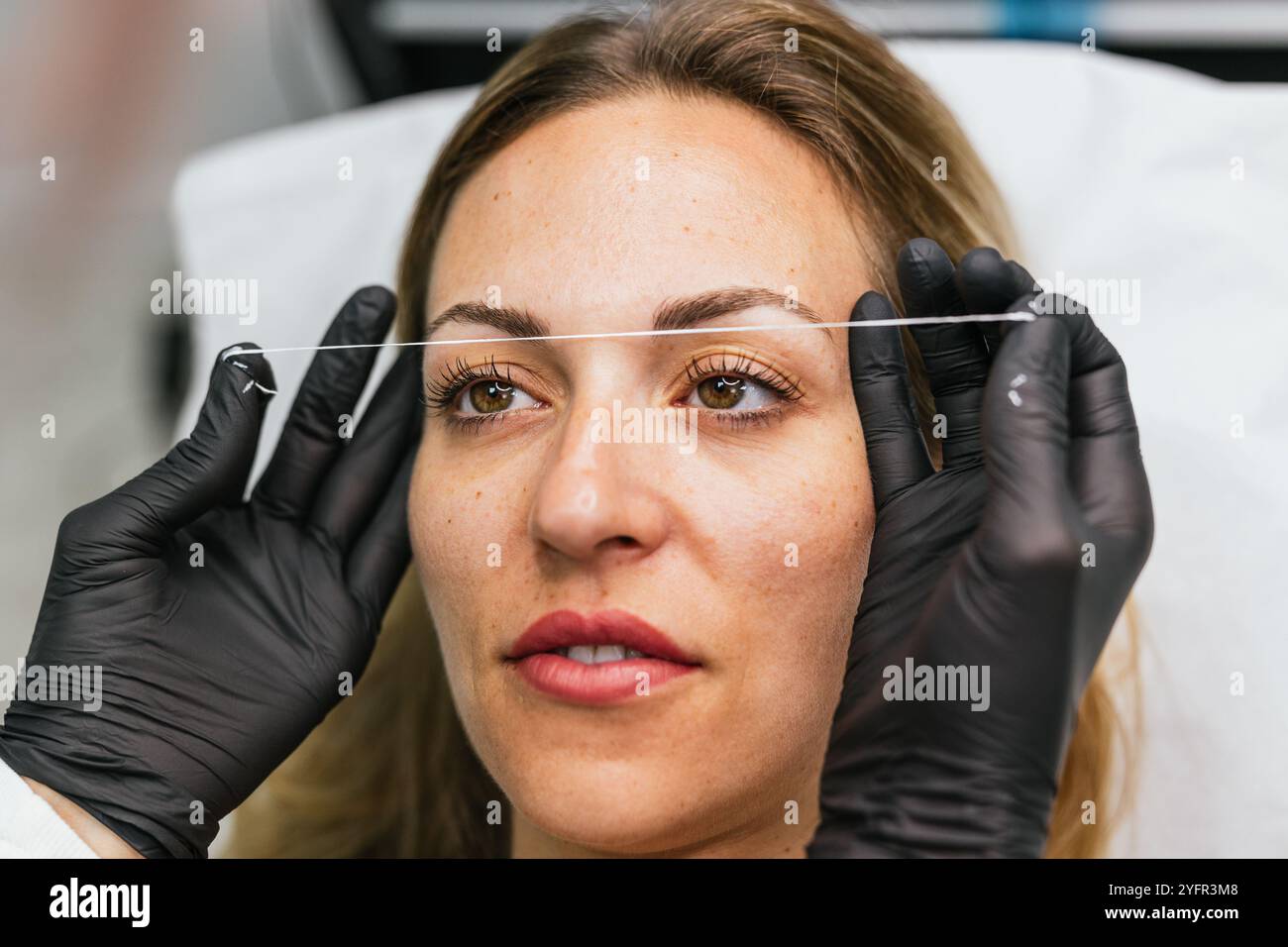 Precise eyebrow design, premicroblading thread marking technique Stock Photo - Alamy