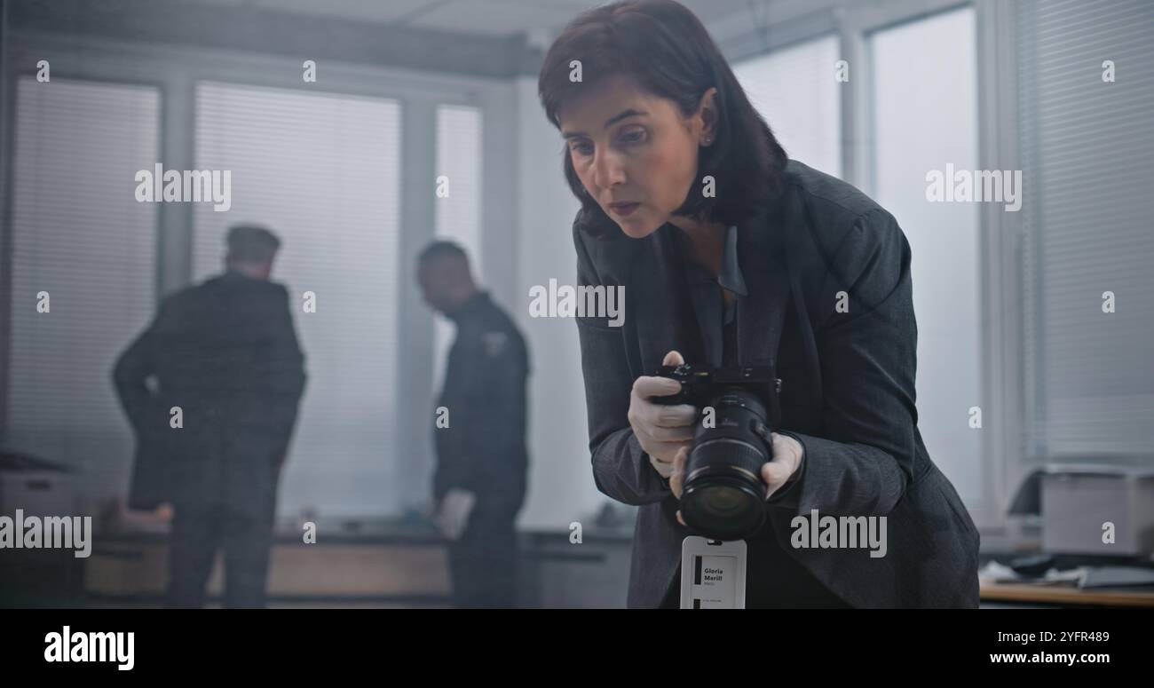 Office robbery or murder case: Female forensic scientist takes photos ...