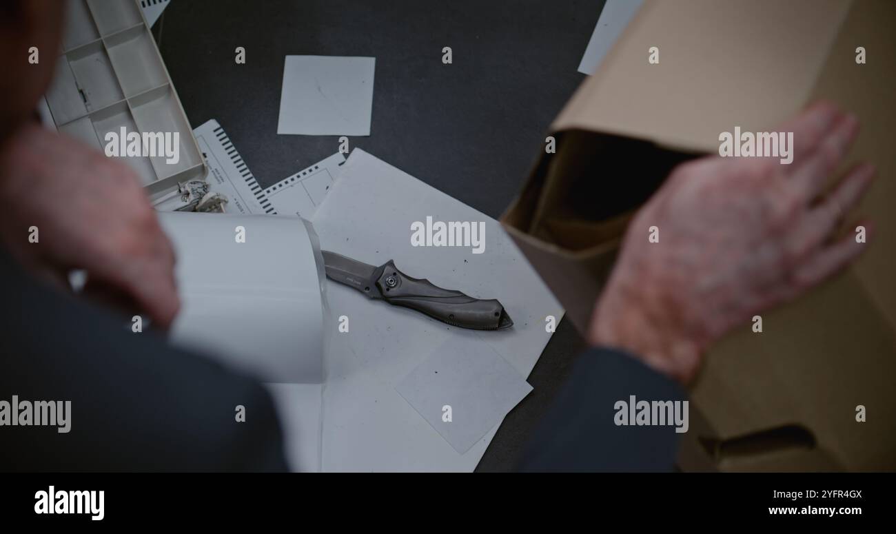 Robbery or murder case in office: Top view on unrecognizable forensic ...