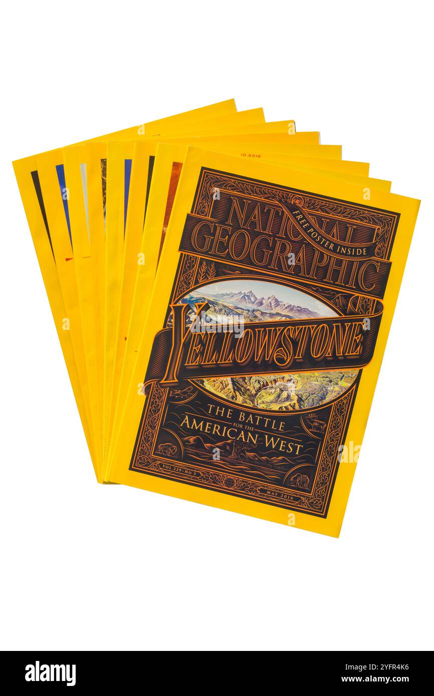 pile of National Geographic magazines isolated on white background ...