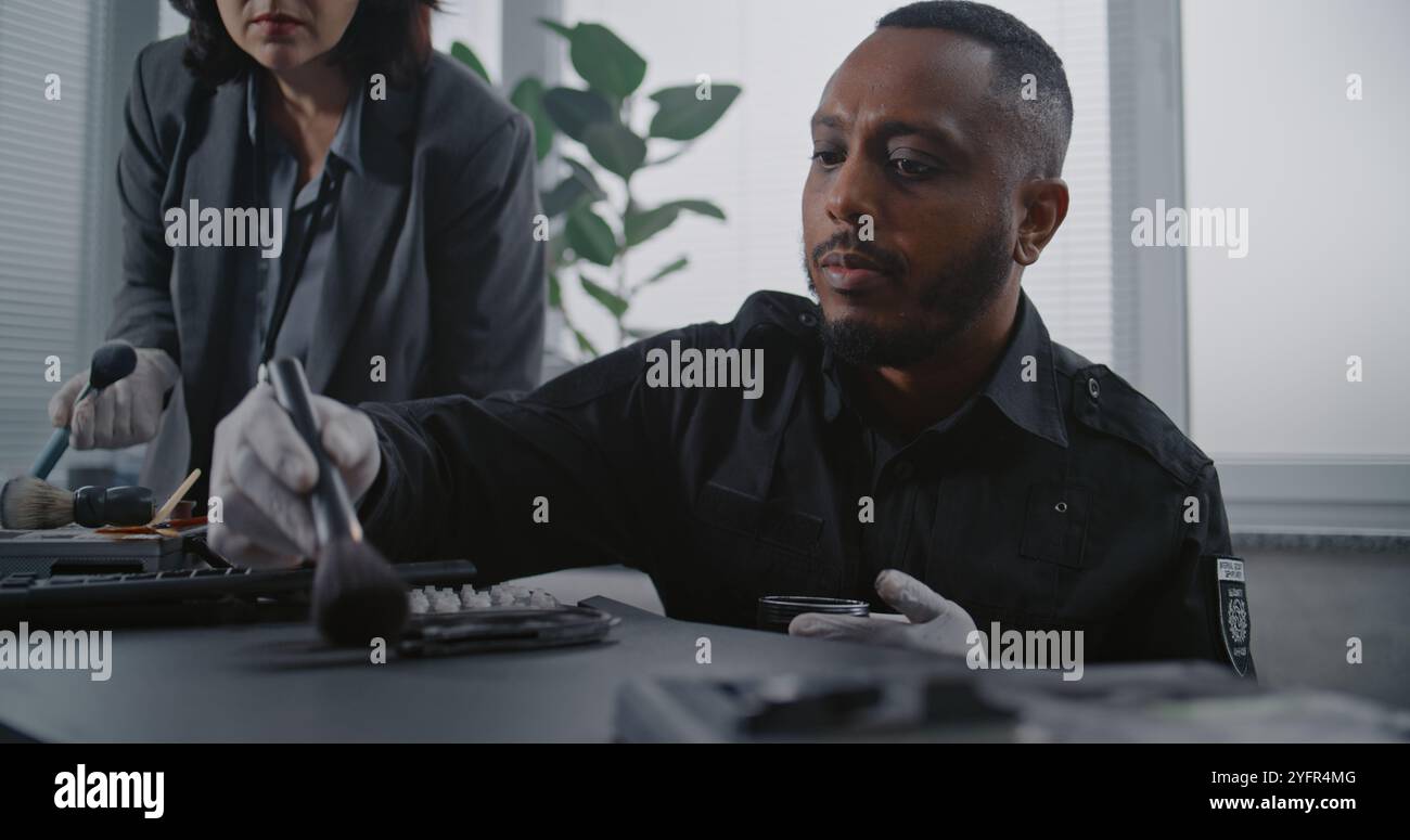 Murder case: Close up of African American policeman searching for ...