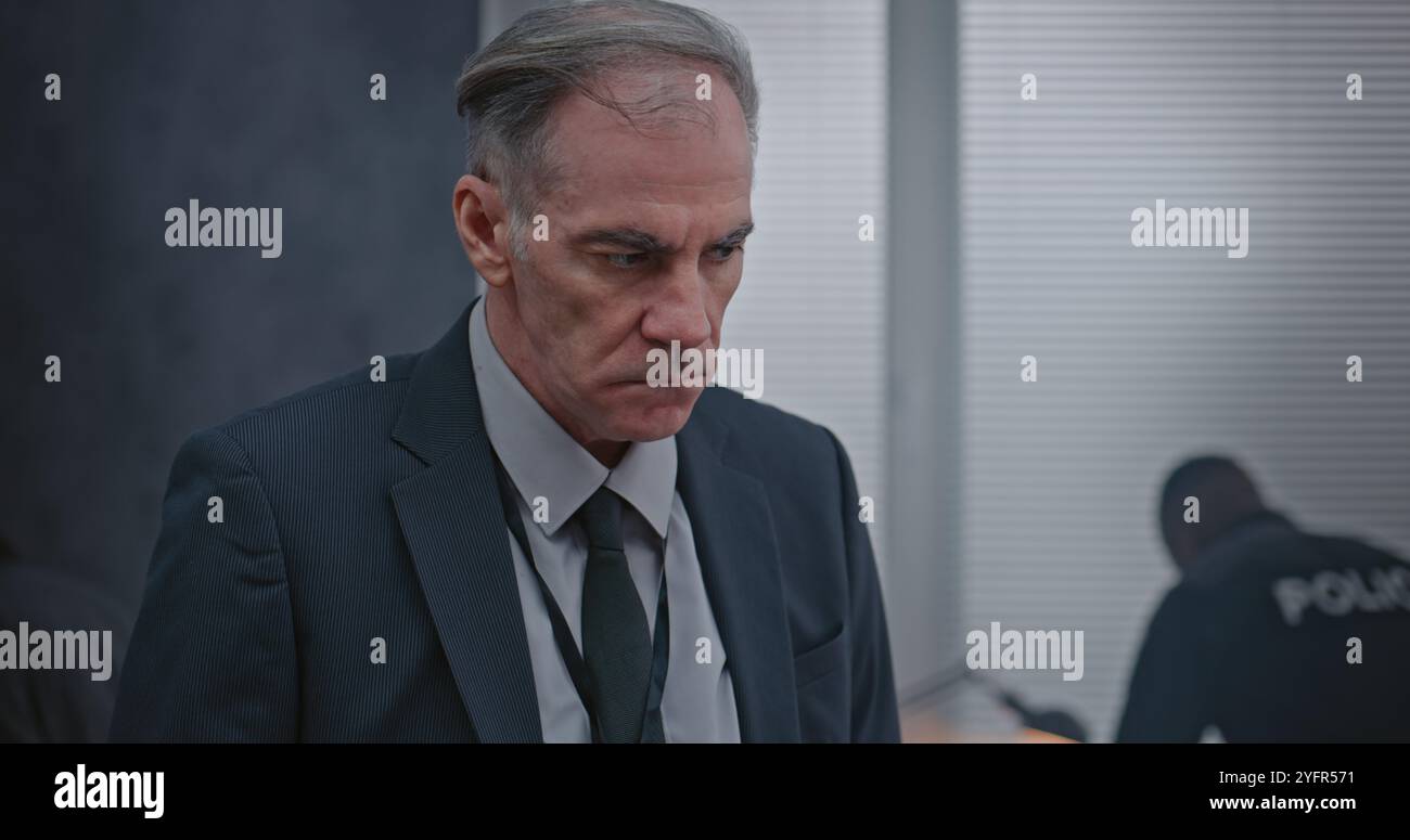 Office robbery or murder case: Crime investigation team working. Male ...