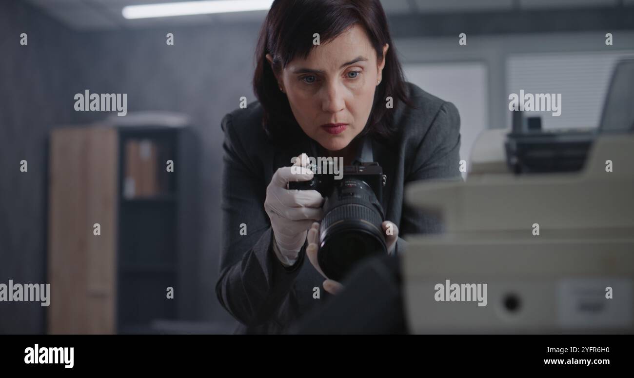 Office robbery or murder case: Female criminalist takes photos of ...