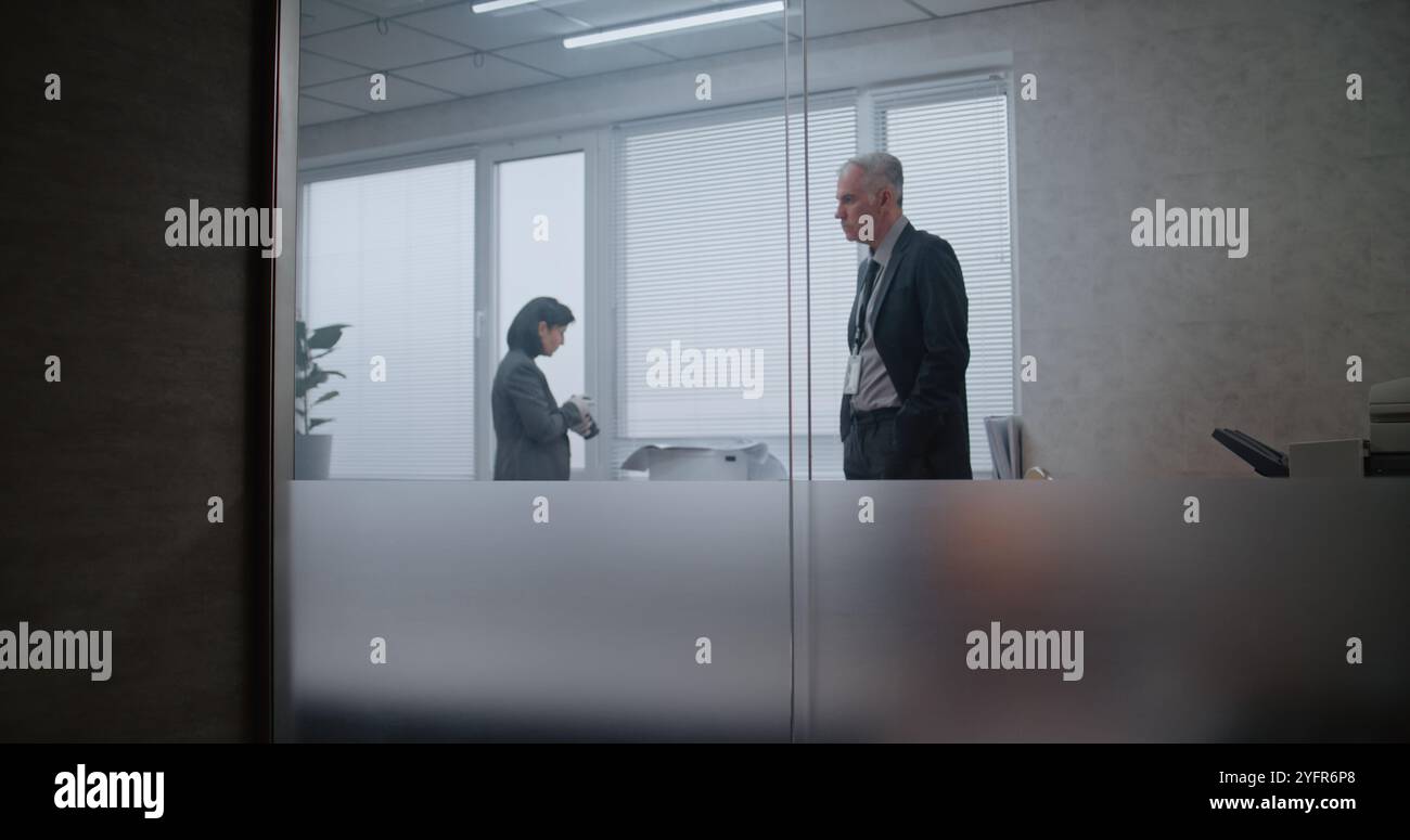 Office robbery case: Crime investigation team at crime scene. Female ...