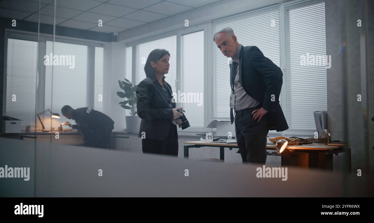 Office robbery case: Female criminalist with professional camera ...