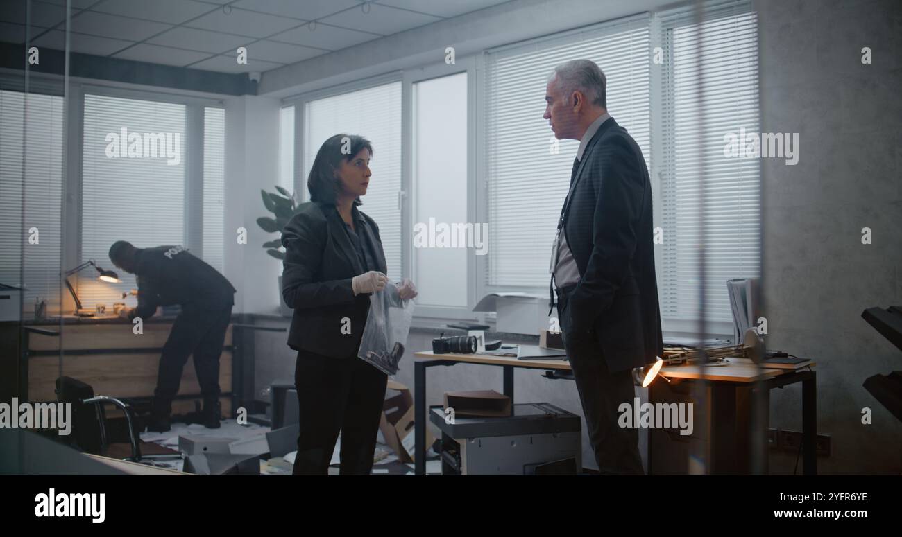 Robbery or murder in office: Female forensic scientist packs gun in zip ...