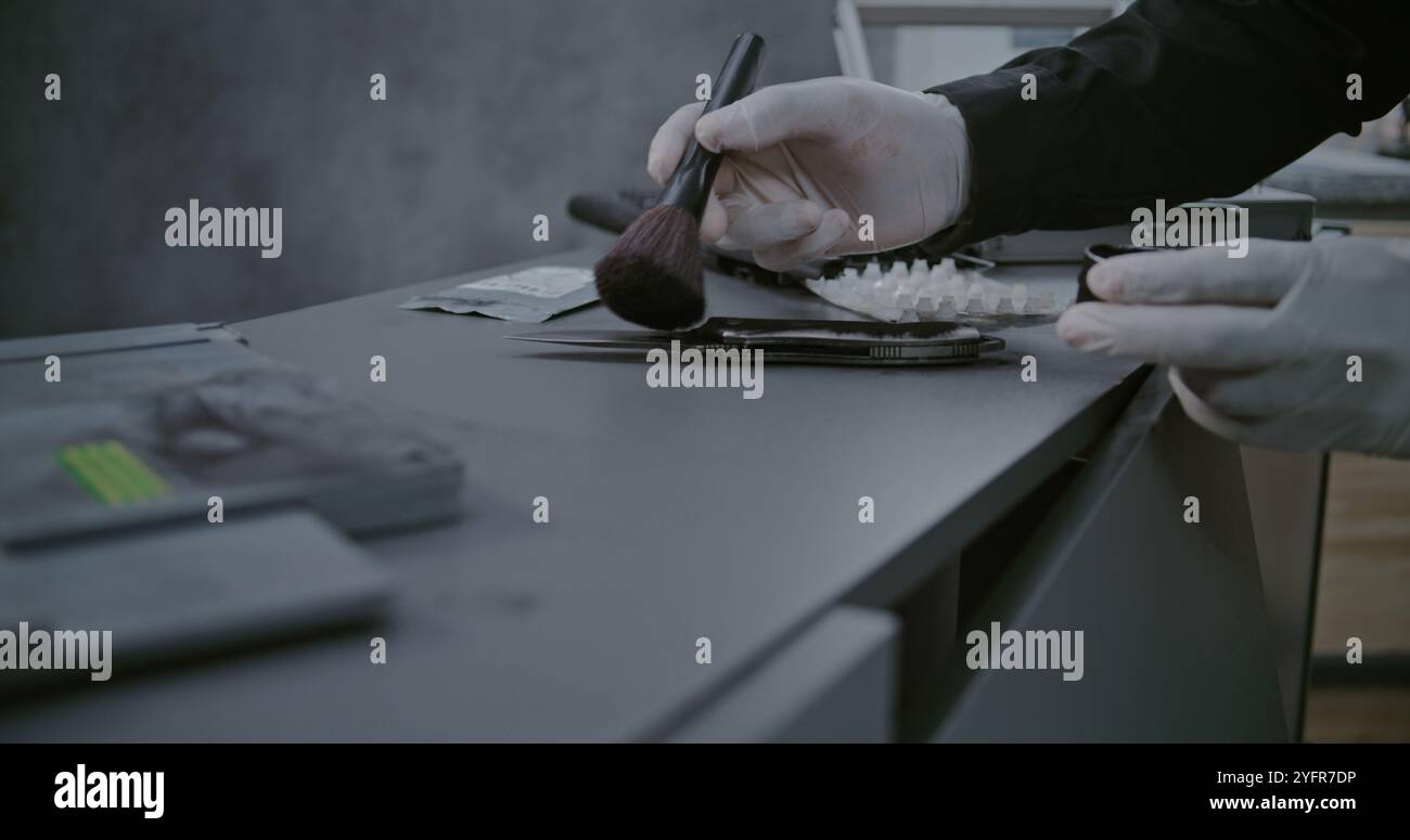 Robbery or murder case: Numbered marker stands next to crime scene evidence. Close up of ...