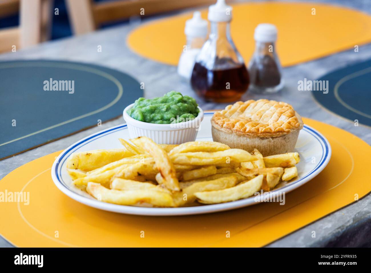 pie mushy peas and chips Stock Photo - Alamy