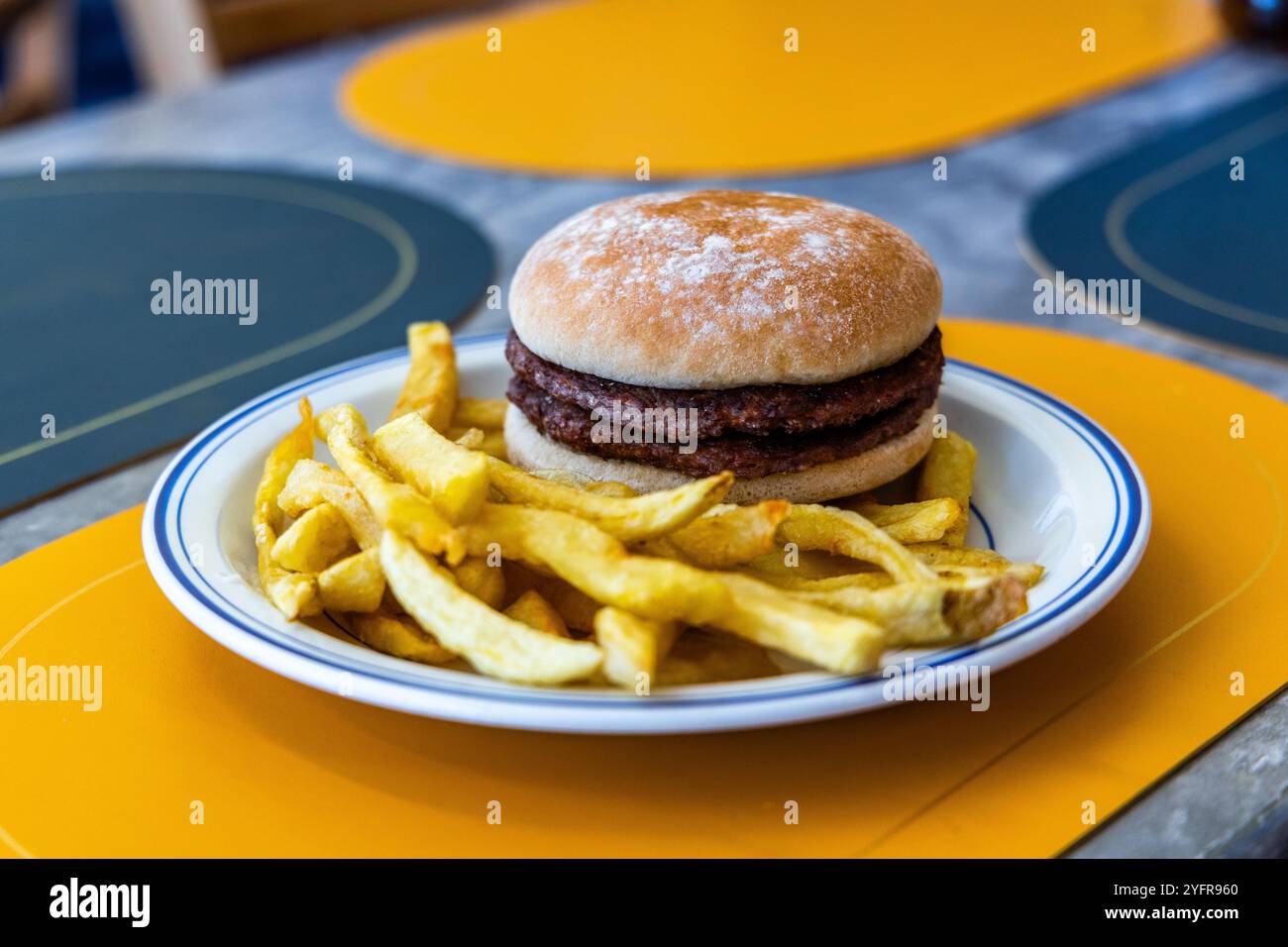 double burger and chips Stock Photo - Alamy