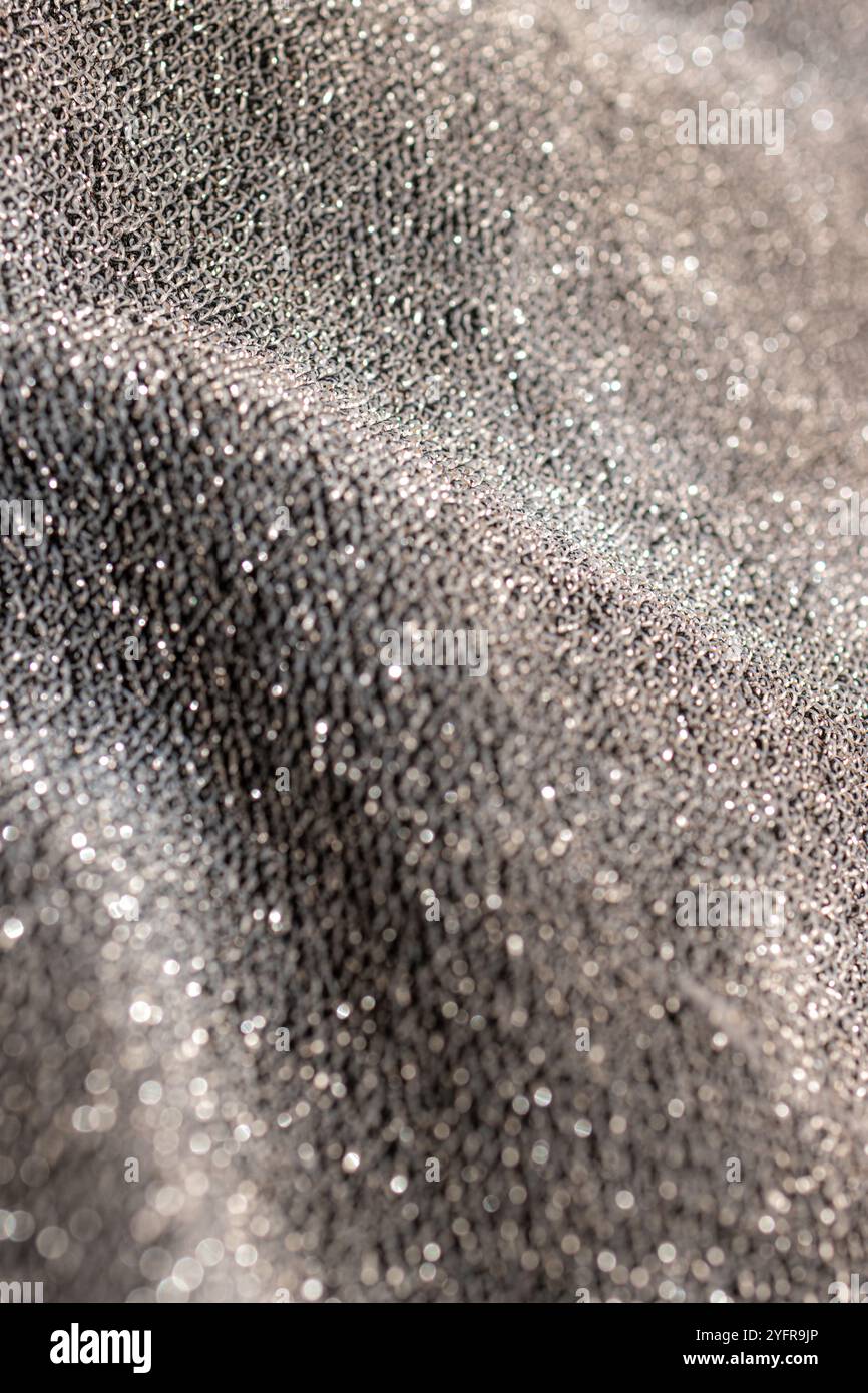 Silver glitter background material.Horizontal blurred metallic surface ...