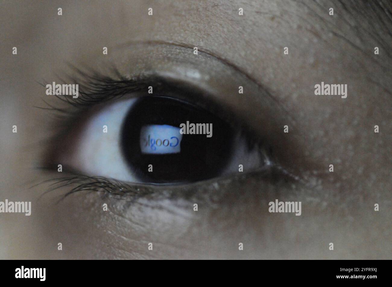 reflection of GOOGLE's writing in the eyes Stock Photo - Alamy
