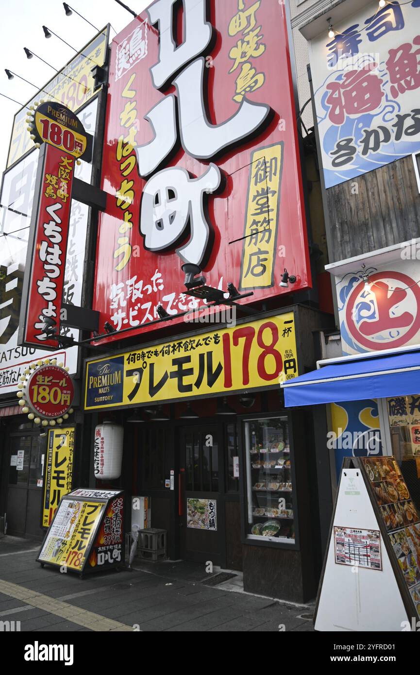 Colorful store signs in Dōtonbori known as one of Osaka's principal ...