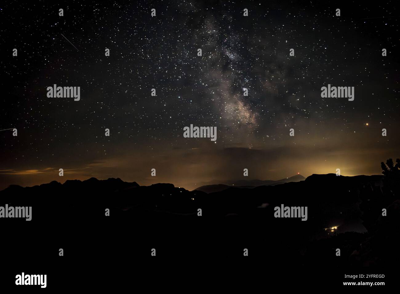 Starry sky with the Milky Way over the Chiemgau Alps, view towards ...