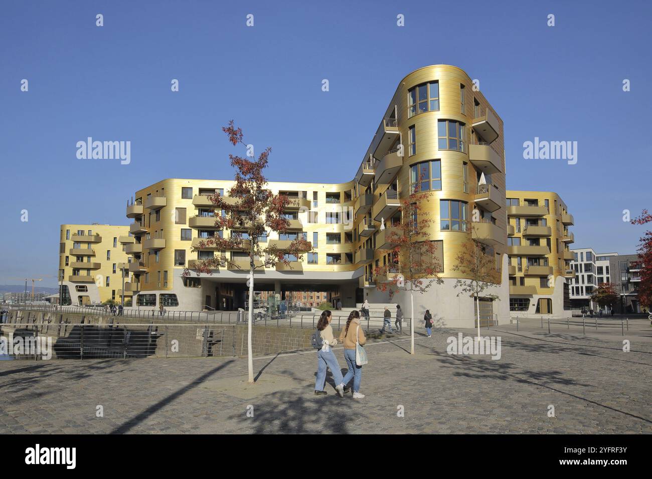 Modern golden building Pandion Doxx, golden, residential complex ...