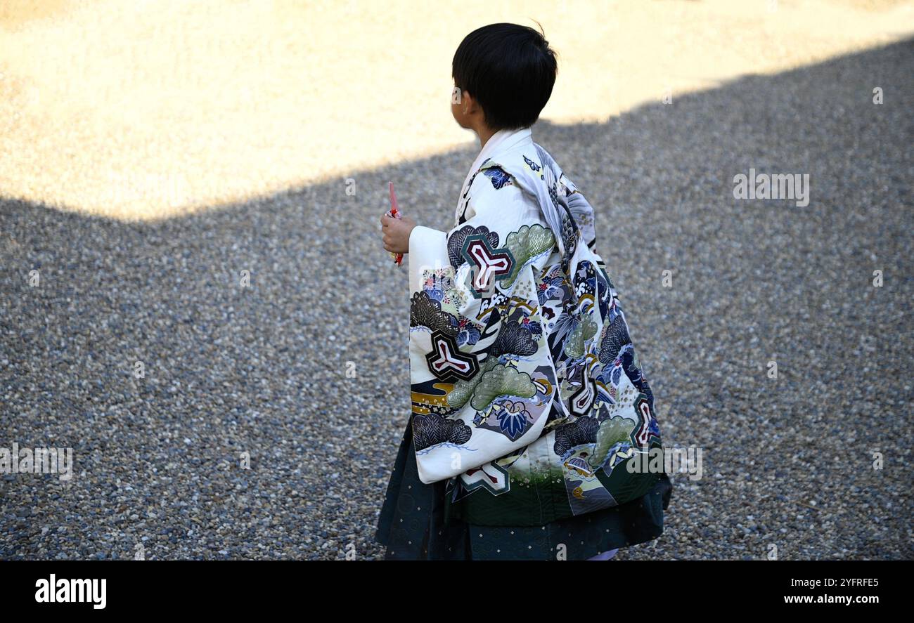 Portrait of a little boy wearing a traditional Japanese Montsuki ...