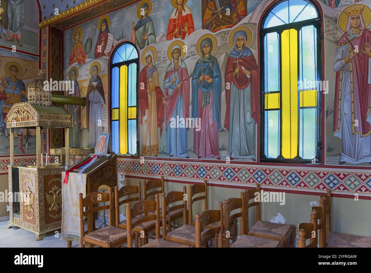 Orthodox church interior with icons, stained glass windows and wooden seating, Church of the ...