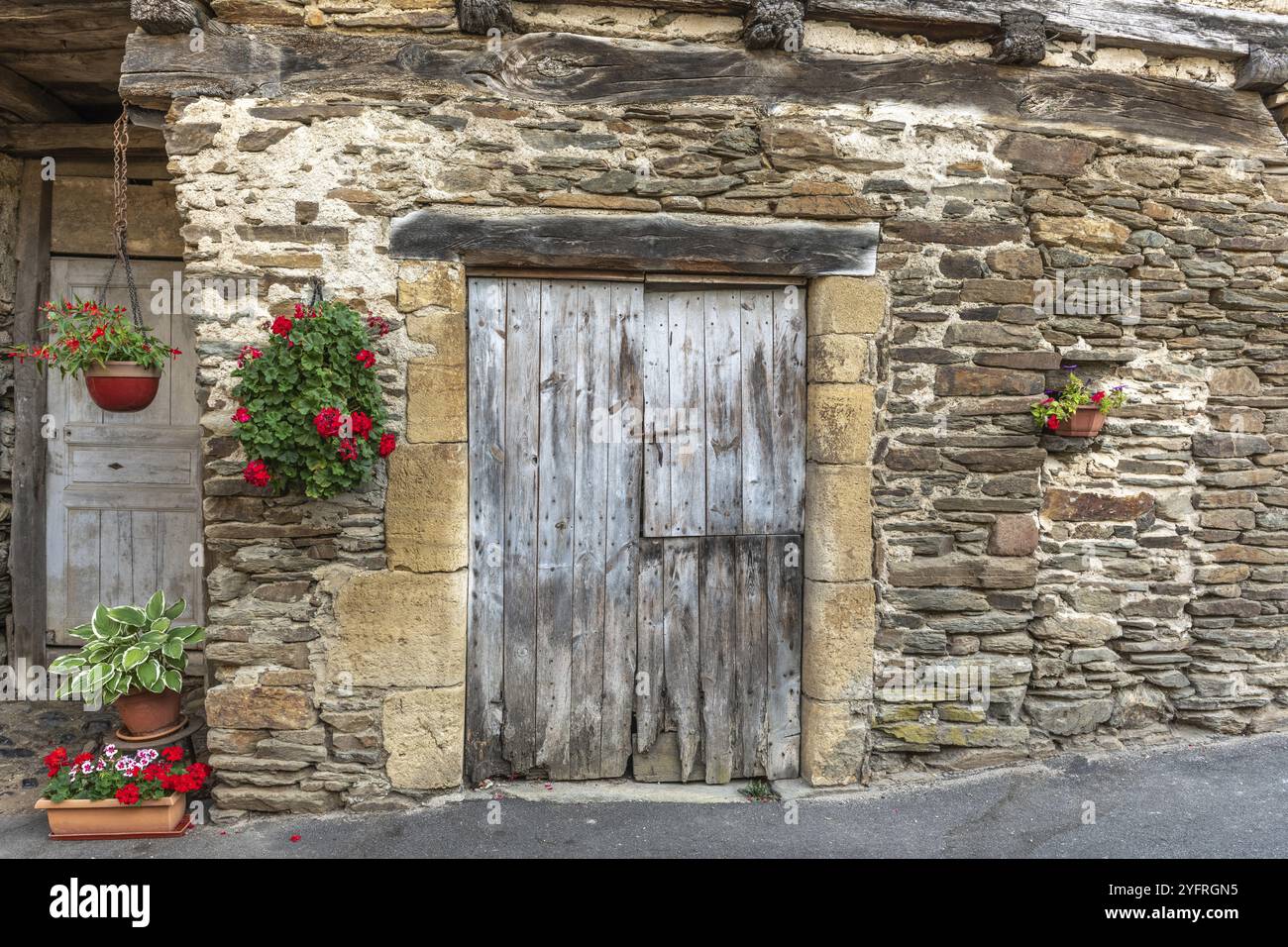 Old wall of a house in the village of Estaing. Aveyron. France Stock ...
