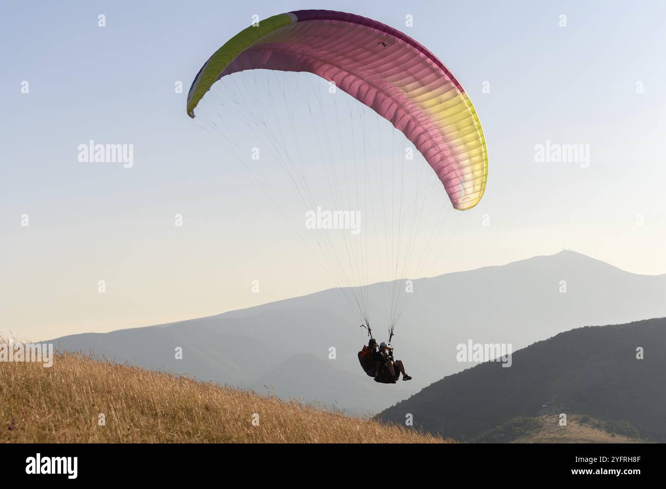 Paragliding flight in the air over the mountains. Drome, France, Europe ...
