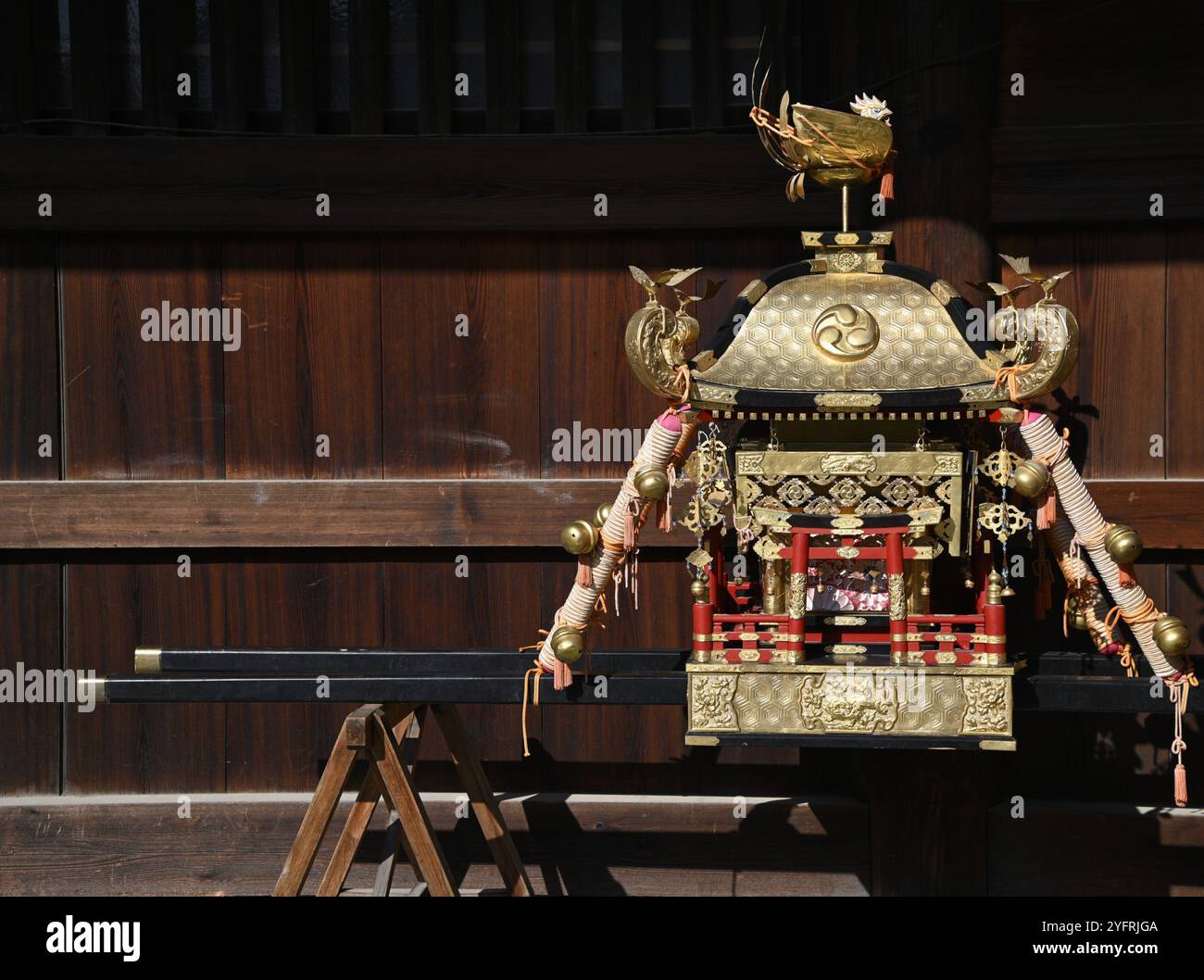 Miniature golden "Mikoshi", a sacred religious palanquin on the grounds ...