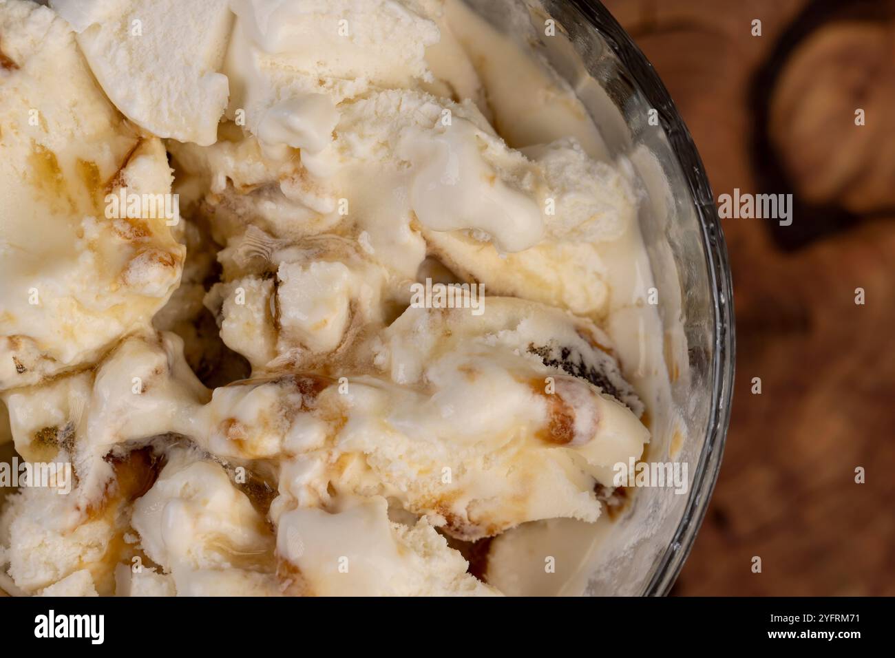 sweet ice cream with natural maple syrup close up, creamy ice cream ...