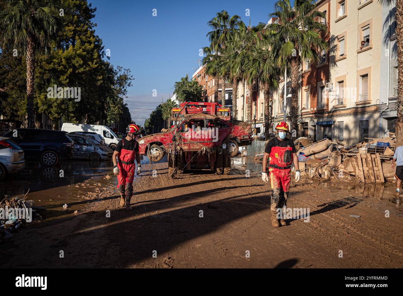 UME (Emergency Militar Unit) are removing cars from the street to make ...