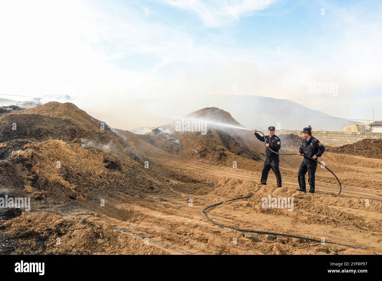 ALTAY, CHINA - NOVEMBER 5, 2024 - Border police put out a fire at a ...