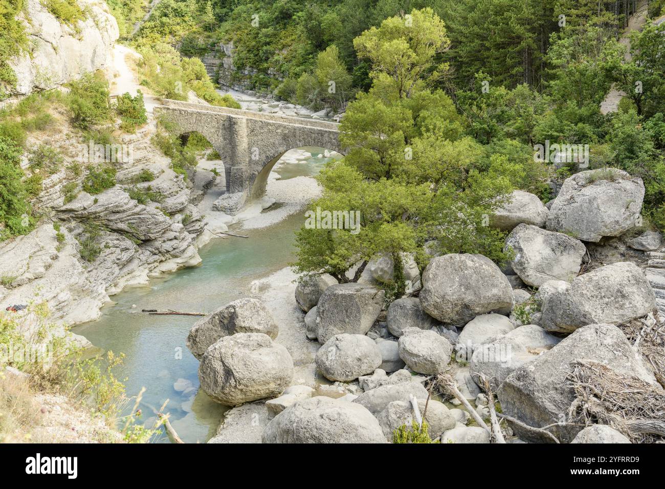 View of the medieval bridge of Chateauneuf de Chabre in the gorges of ...