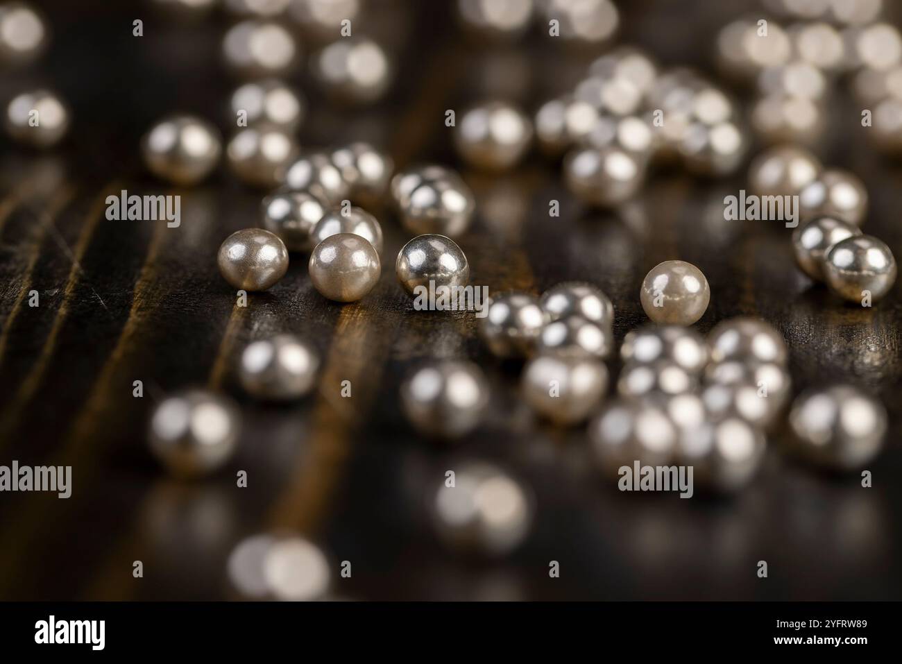 round candies with a shiny surface, sweet sugar candies for decorating ...