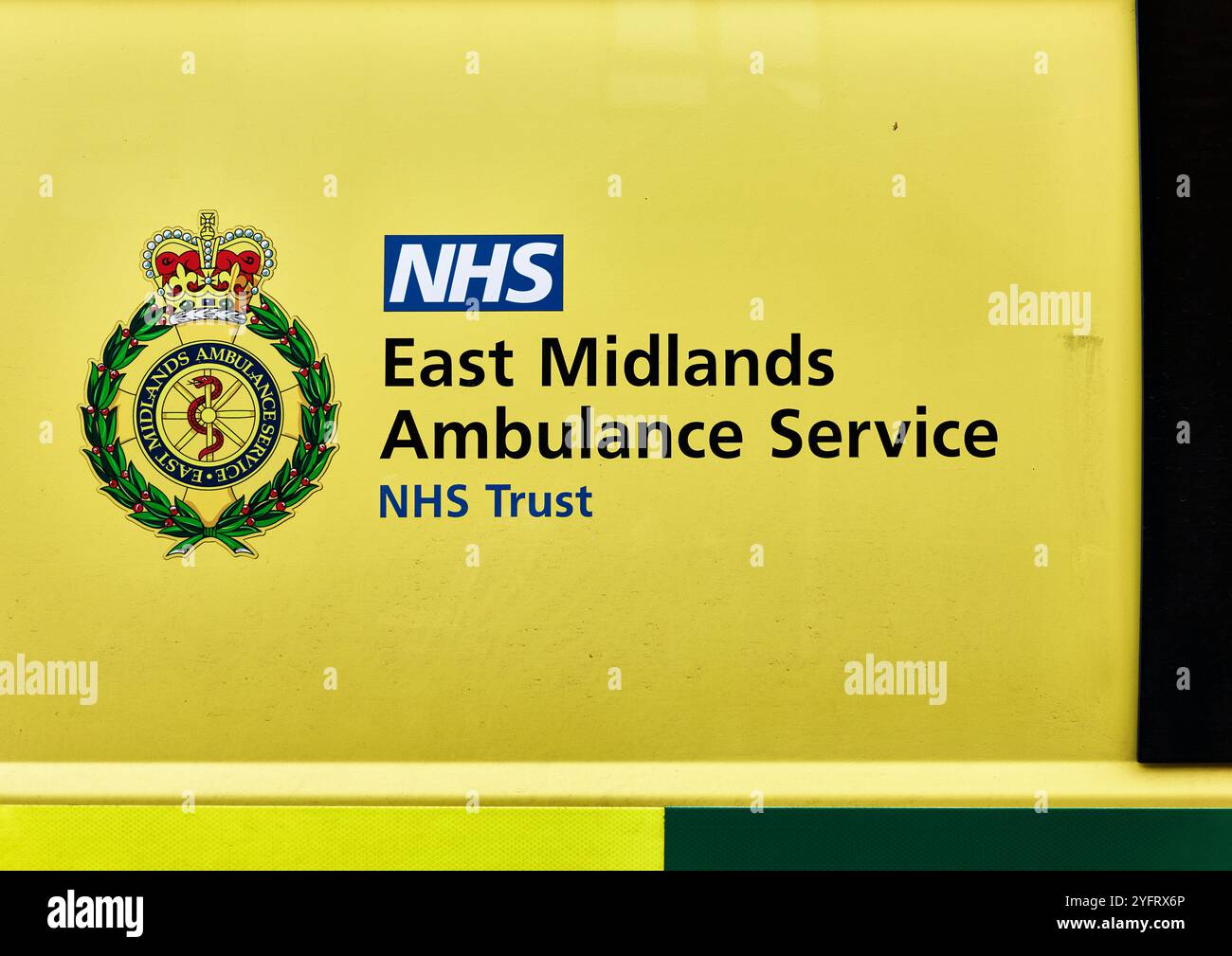 An NHS East Midlands Ambulance Service label on an emergency ambulance ...