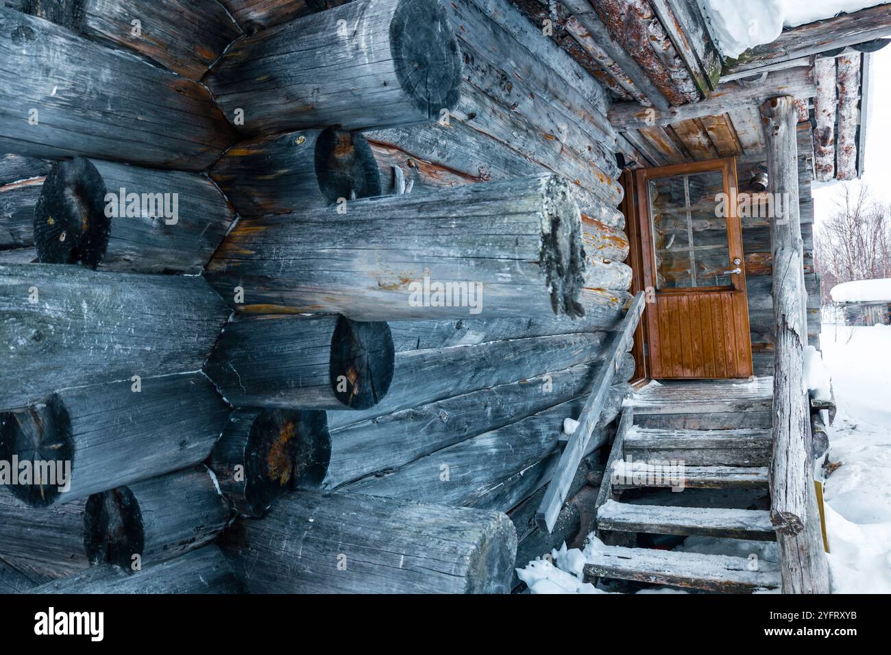 Traditional heritage Finnish wilderness log cabin entrance, natural ...
