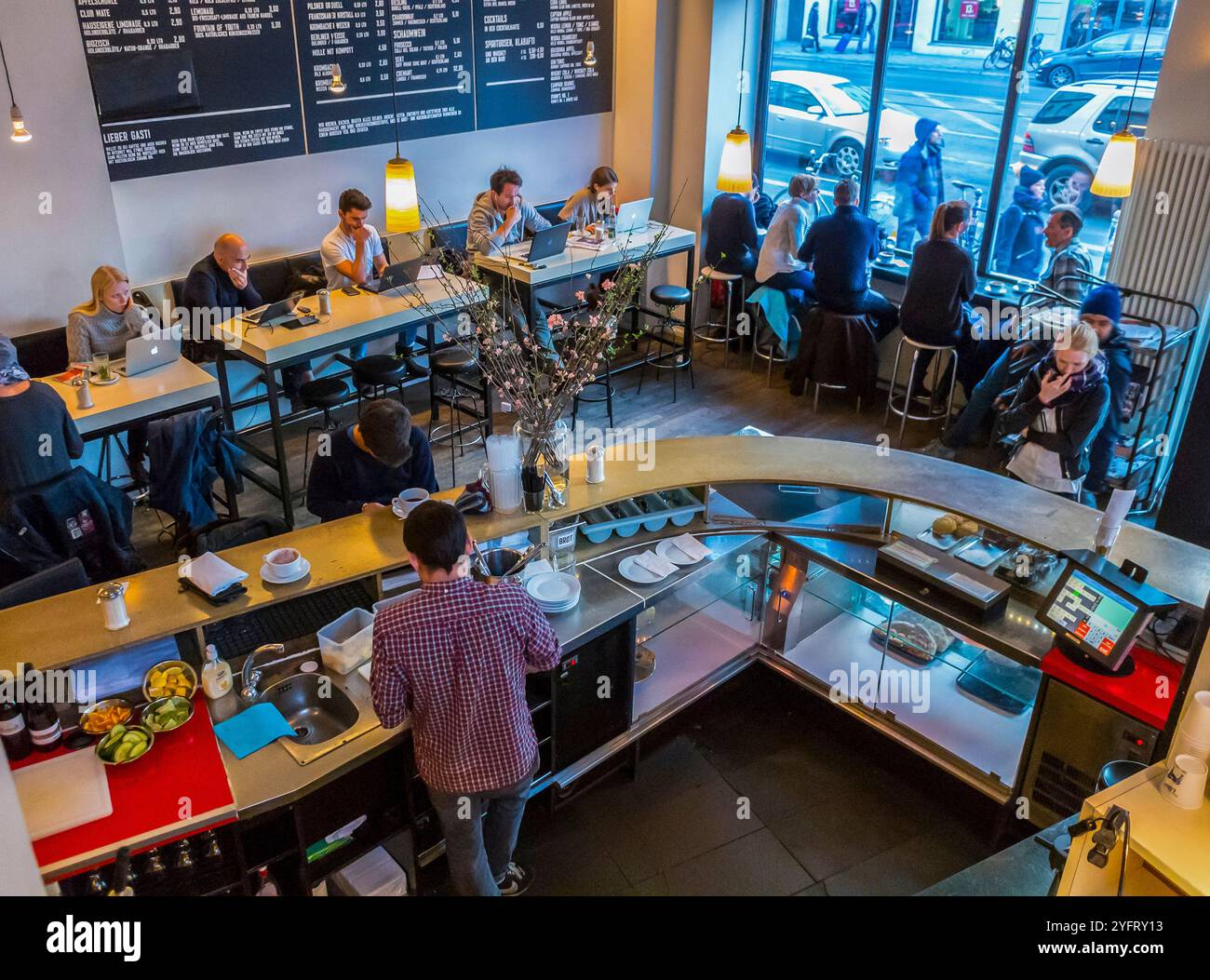 Berlin, Germany, Crowd of Young People, Teenagers, Working inside ...