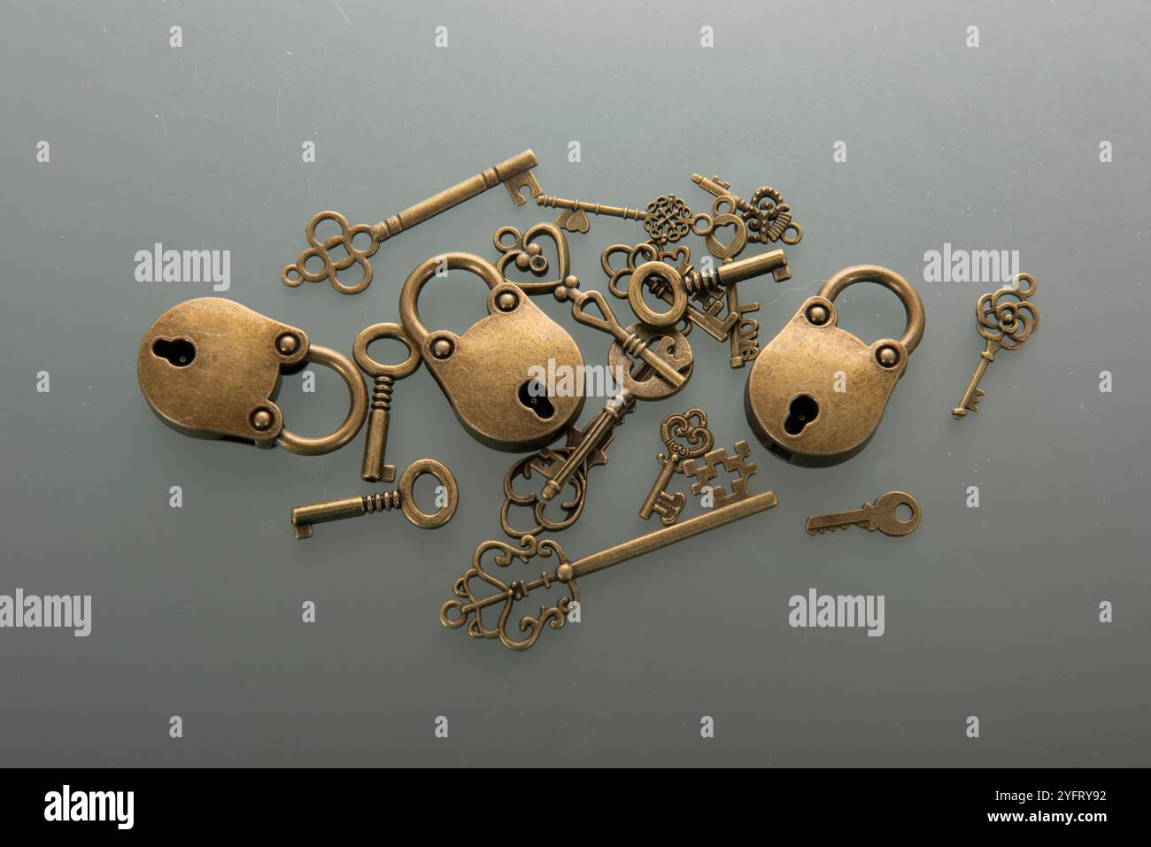 Many copper locks and keys Stock Photo - Alamy