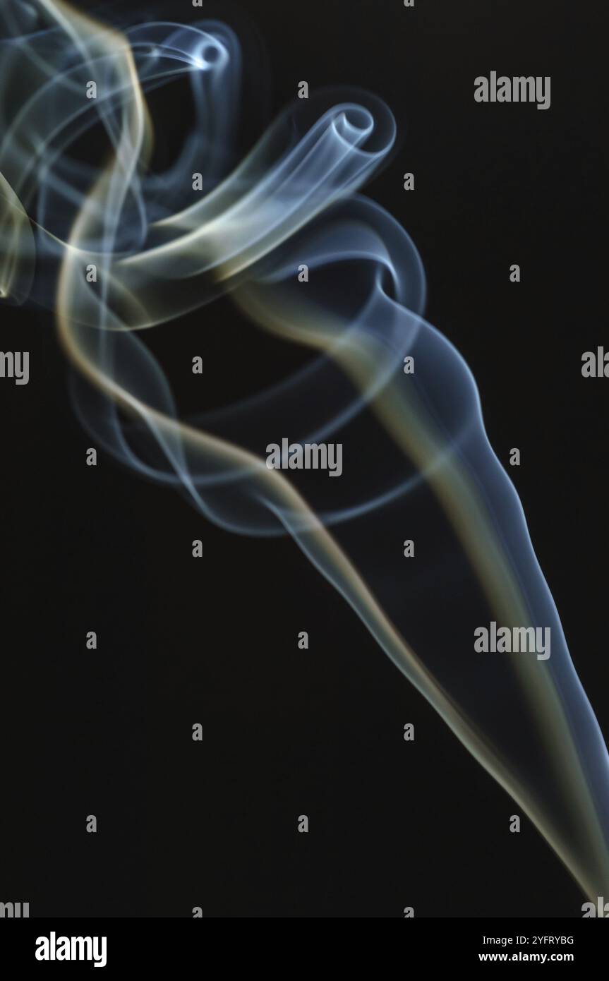 Trajectory of incense smoke in the air showing different shapes. France ...