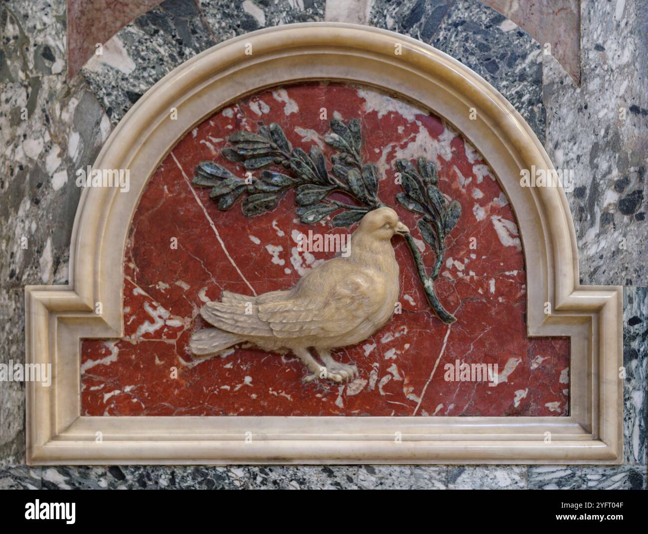 Dove with olive branch. Detail of marble decoration along the pillars ...