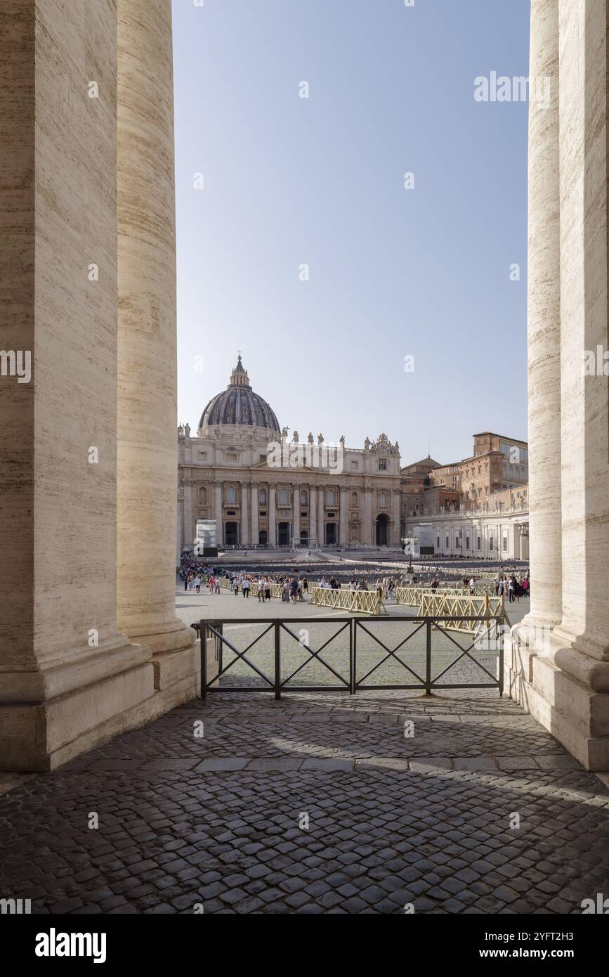 Saint Peter's Basilica framed by Bernini's colonnade in Vatican City ...