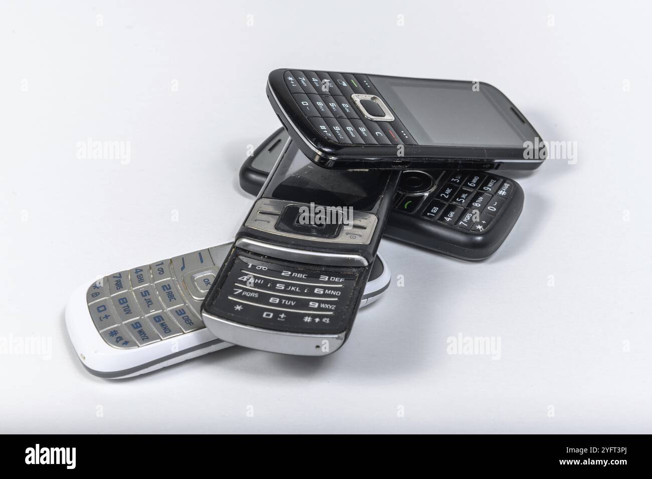 Obsolete used mobile phones for recycling Stock Photo - Alamy