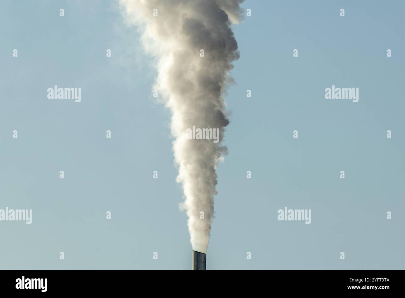 Column of smoke coming out of an industrial chimney. France Stock Photo ...