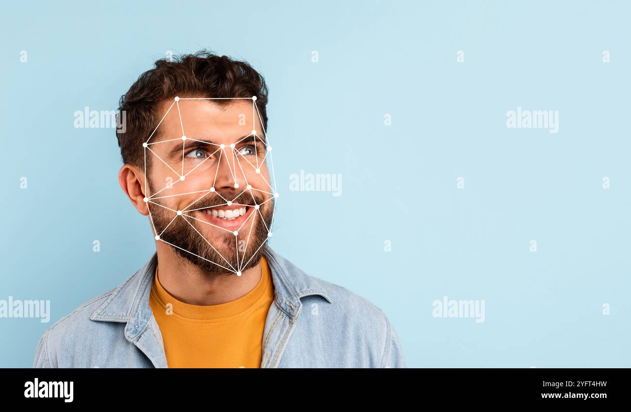 Man smiling with facial recognition overlay against blue background ...
