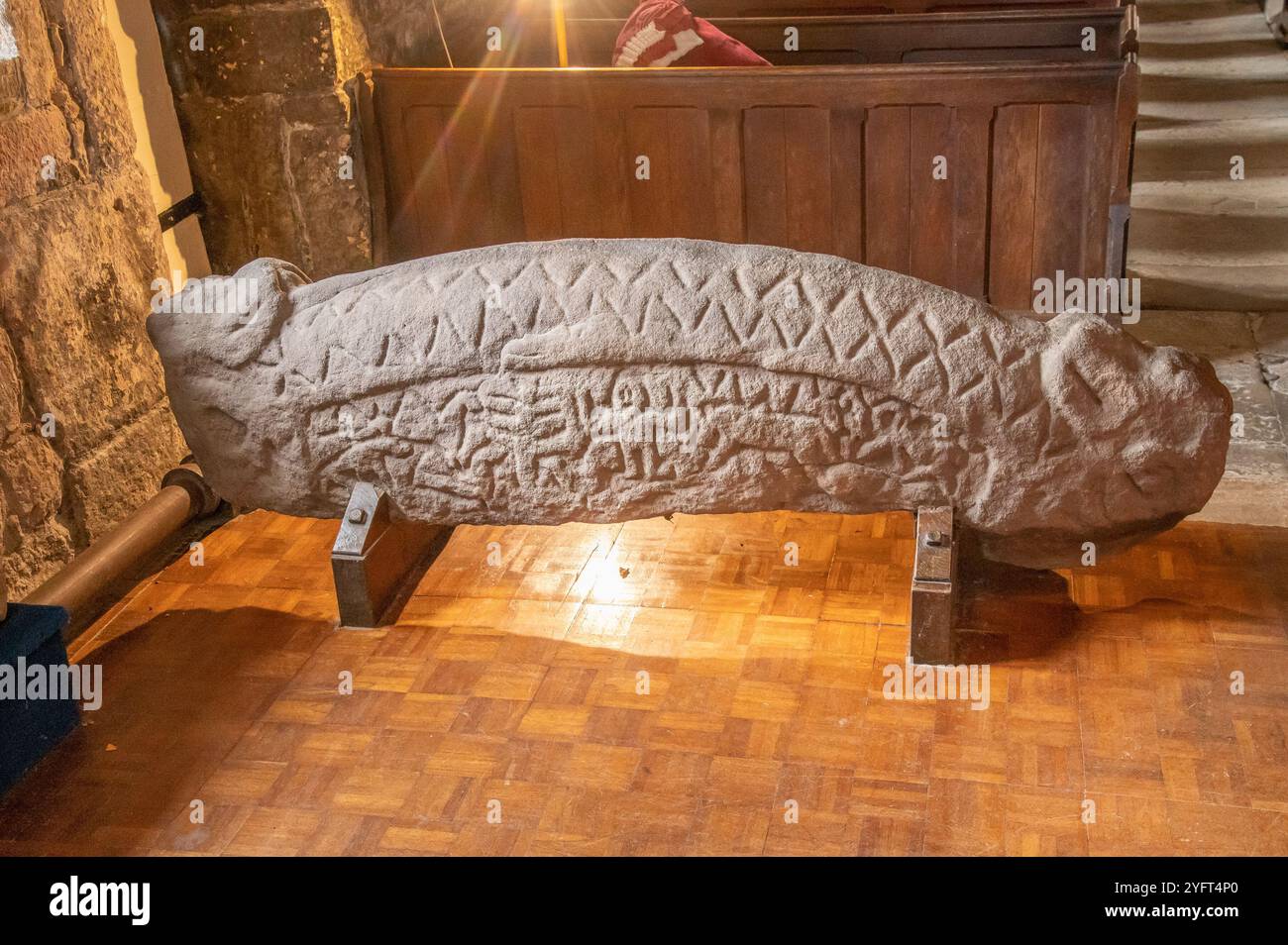 The 10th century Viking hogback stone in the Parish Church of St. Peter ...