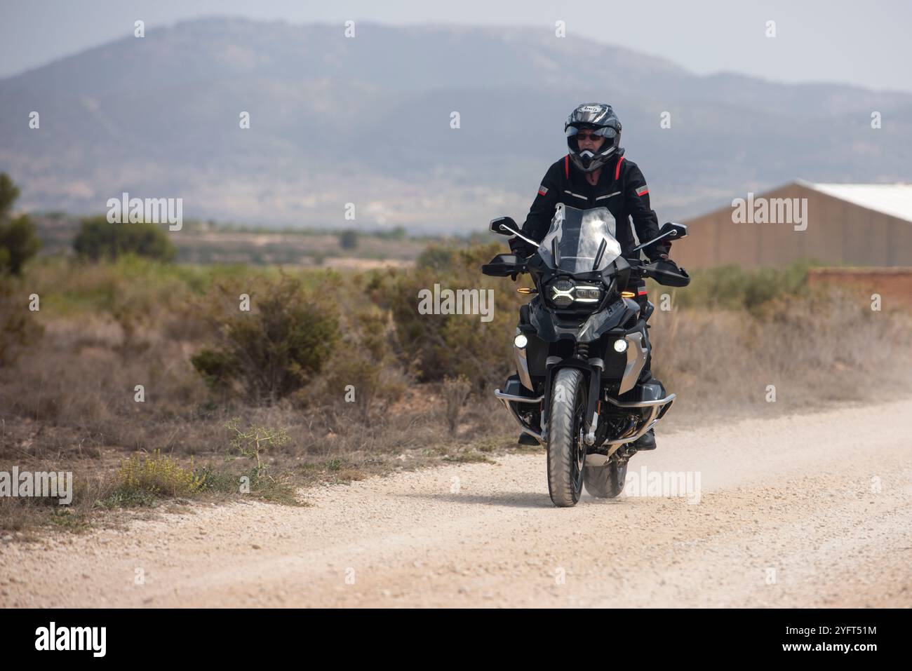 Riding a motorcycle off-road Stock Photo - Alamy