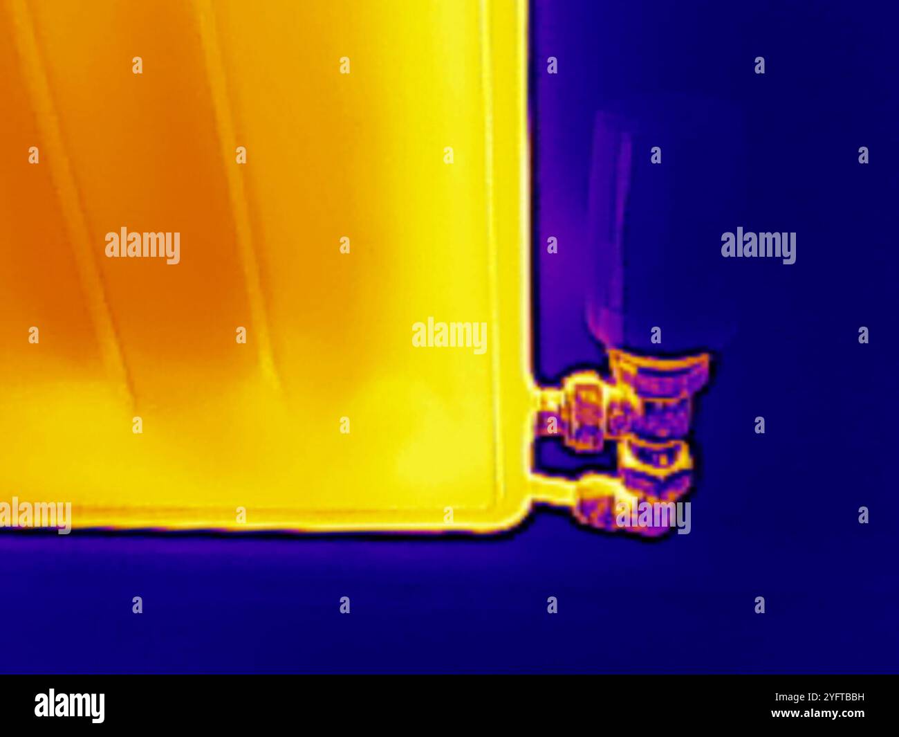 Thermal camera image showing wall-mounted domestic radiator with ...