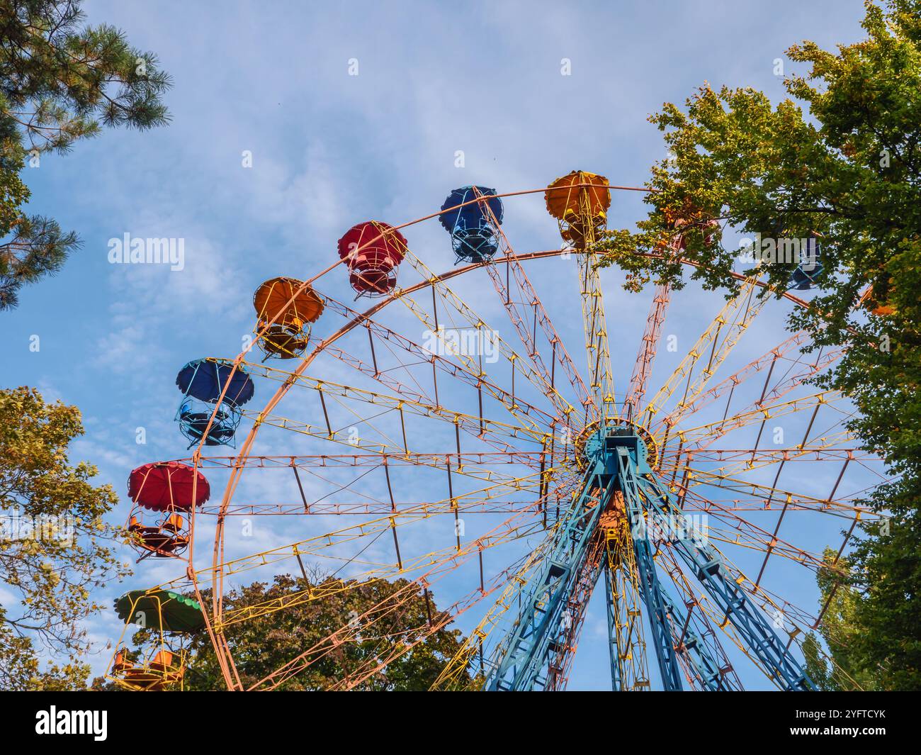 Colorful panoramic observation wheel of Soviet era on a sunny autumn ...