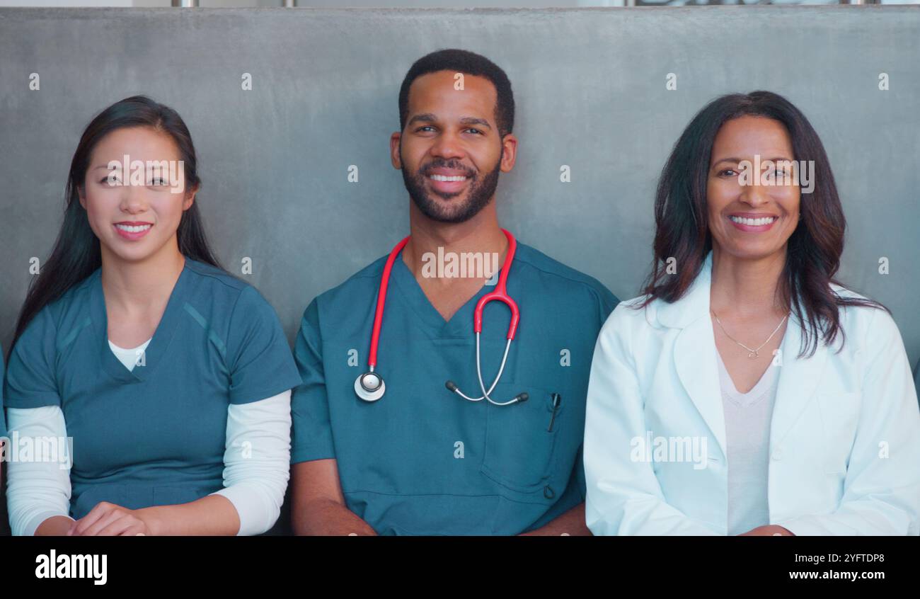 Portrait Of Multi-Cultural Medical Or Surgical Team Wearing Scrubs ...