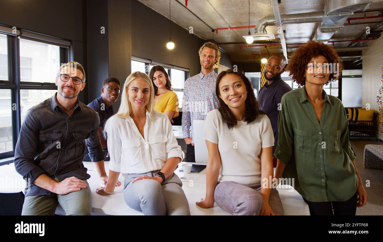 Smiling multi cultural business team hi-res stock photography and ...