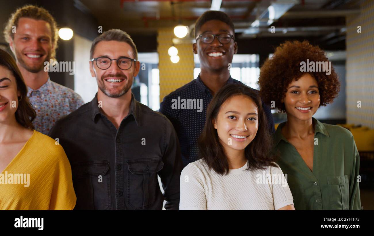 Smiling multi cultural business team hi-res stock photography and ...