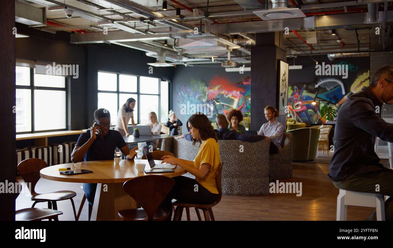 Informal Meeting Area In Modern Office With Businesspeople Meeting And ...