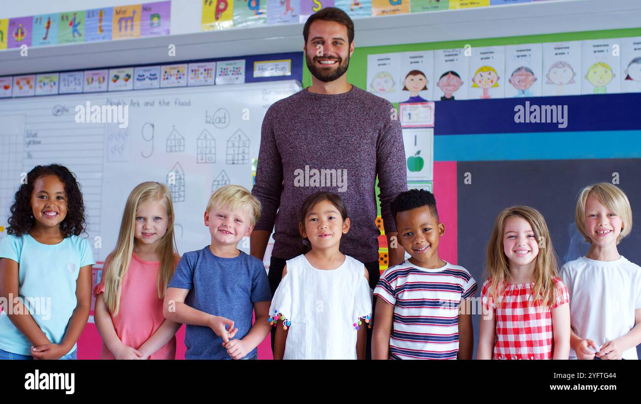 Portrait Of Multi-Cultural Elementary School Pupils Standing In ...