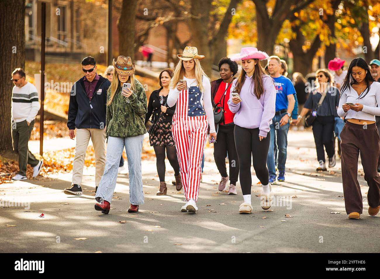Political activists march to a Harris rally in Allentown, Pennsylvania ...