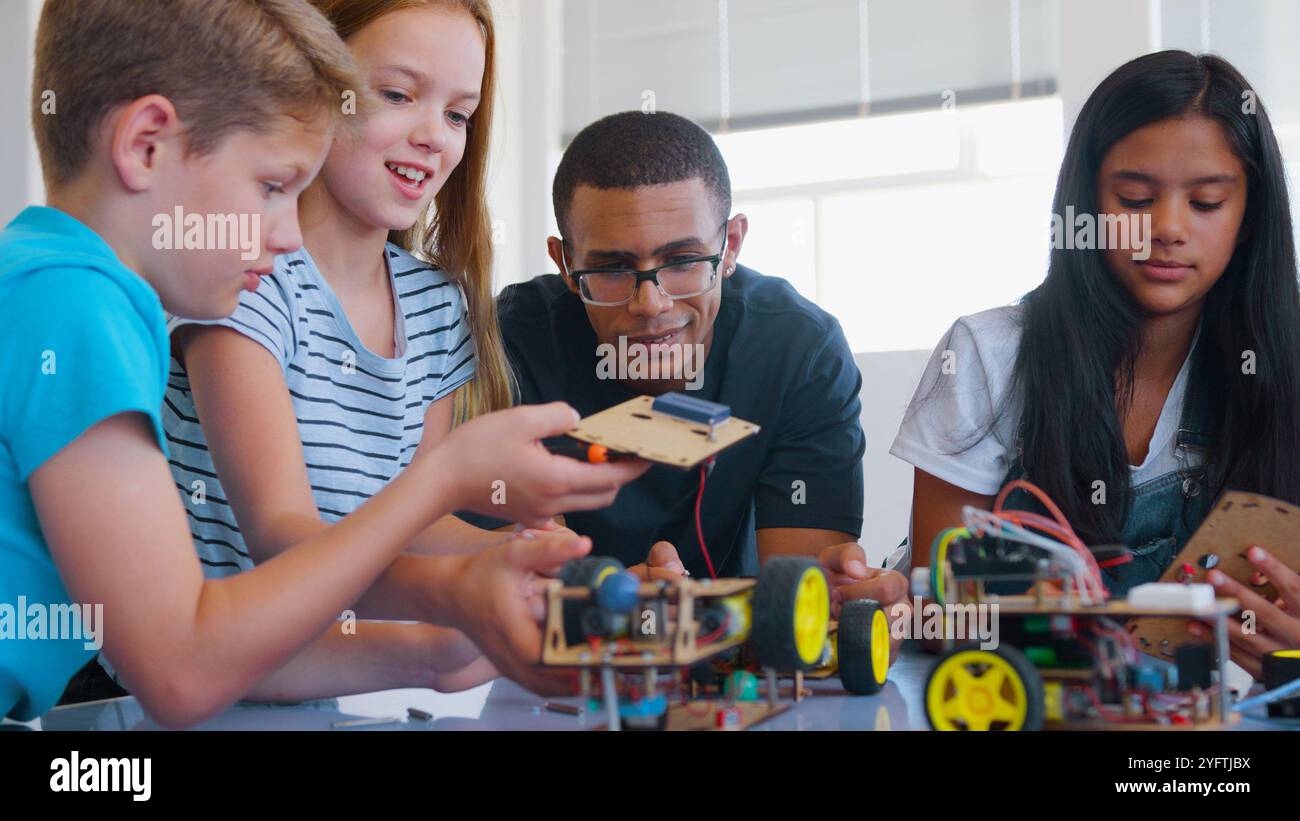 Computer programming teacher hi-res stock photography and images - Alamy